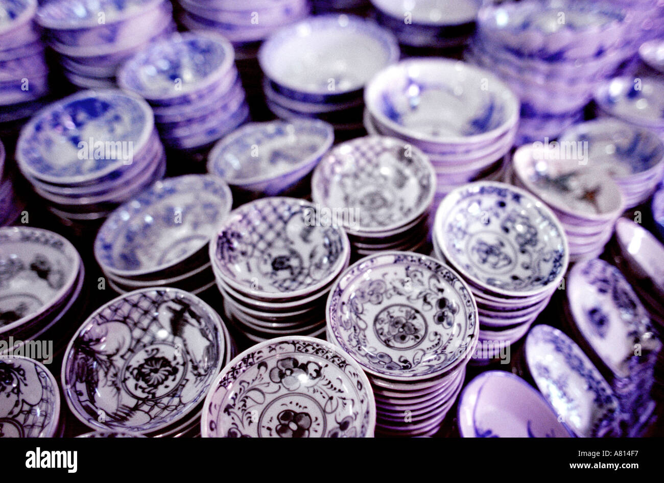 Drying decorated ceramic plates Stock Photo - Alamy
