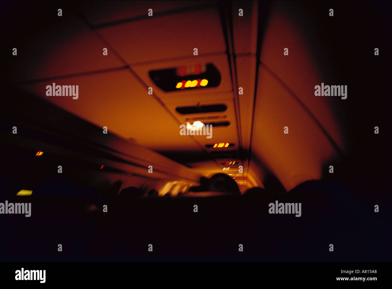 Airline interior at night during takeoff Stock Photo - Alamy