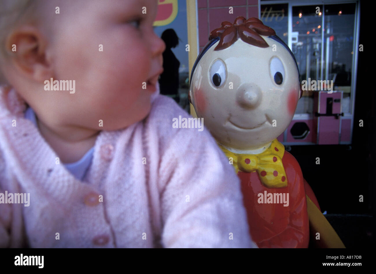 baby girl at fairground Stock Photo - Alamy