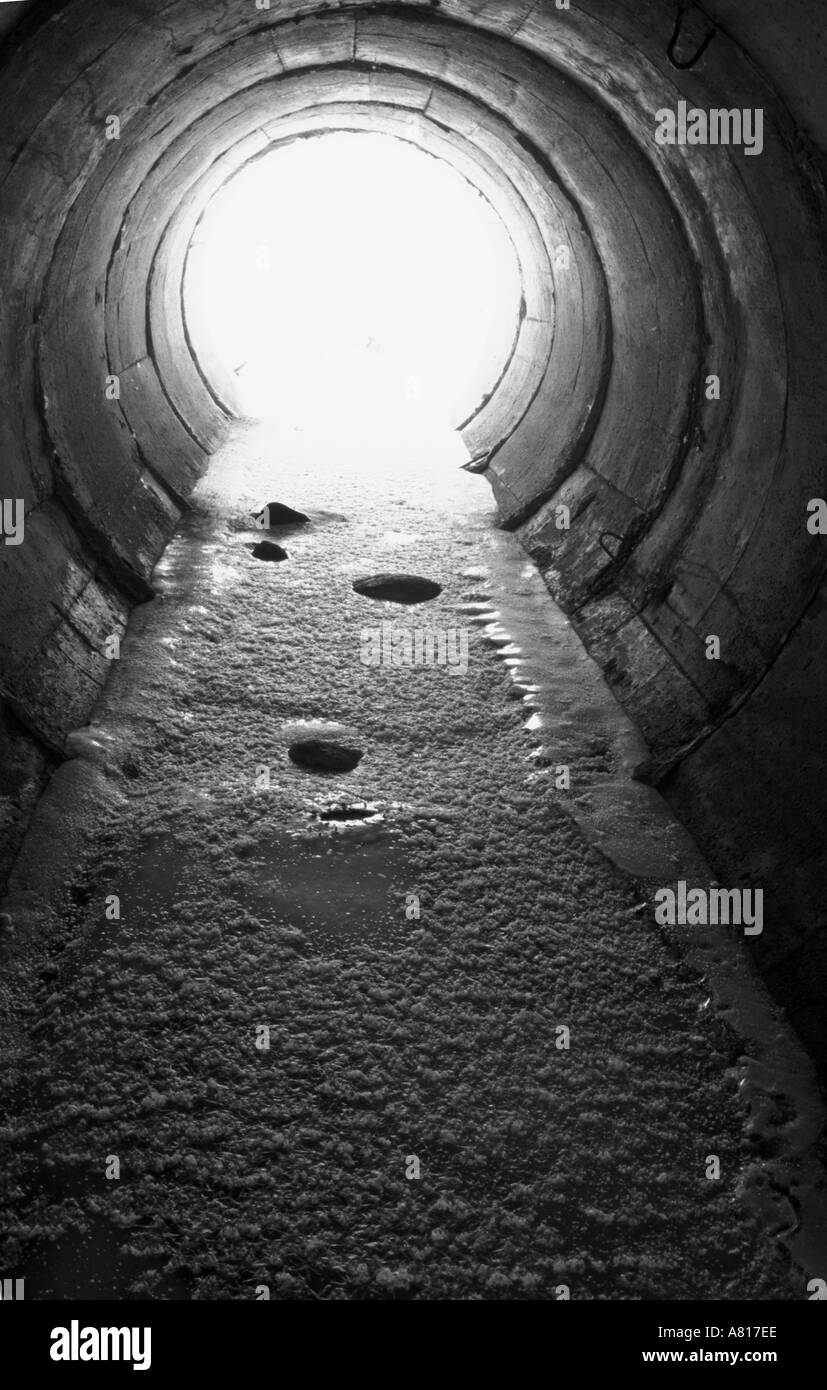 drainage trench tunnel in early spring Stock Photo - Alamy