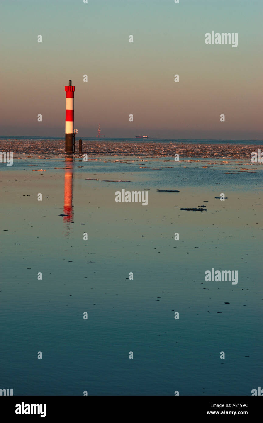 Lighthouse in the north german wadden sea Stock Photo - Alamy