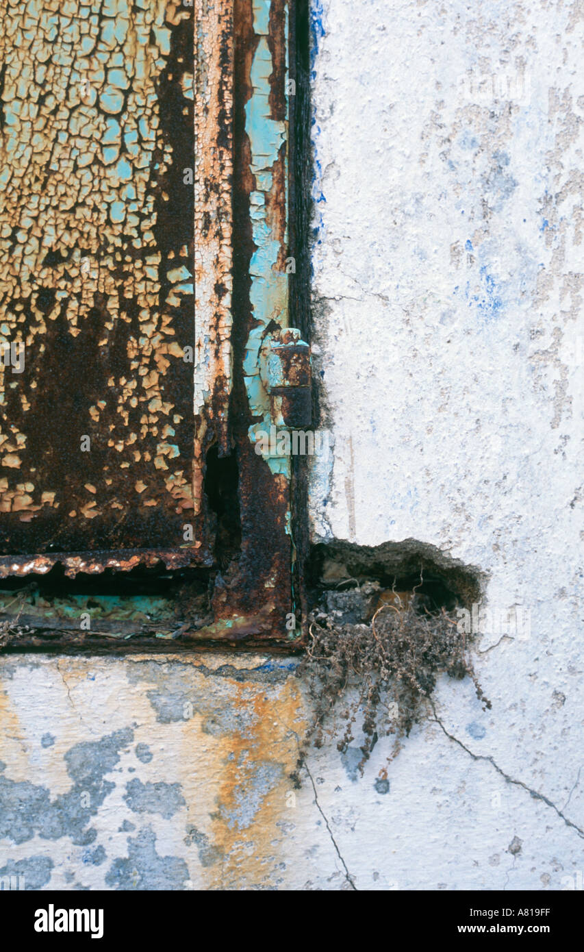Old window frame rusting and crumbling on traditional house Maritsa ...
