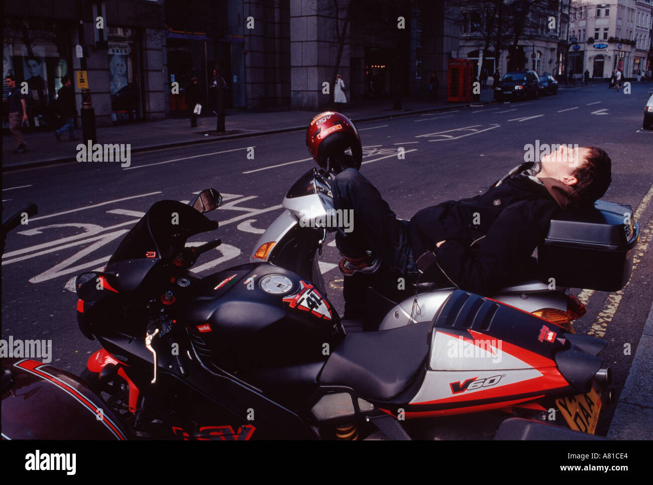 Man sleep motorcycle hi-res stock photography and images - Alamy