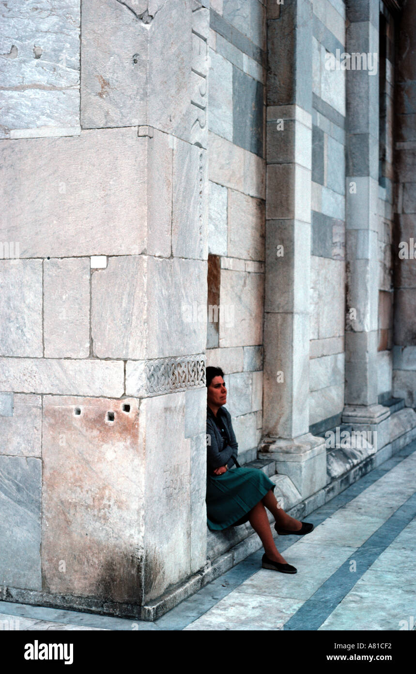 Woman in a wall hi-res stock photography and images - Alamy
