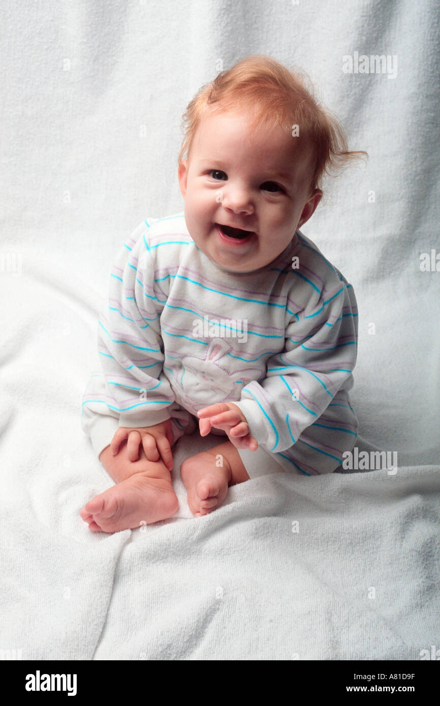new born baby laughs and smiles at camera Stock Photo - Alamy