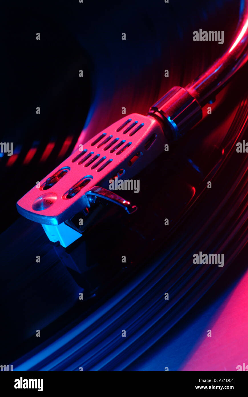 record turntable arm and needle playing a vinyl record Stock Photo - Alamy