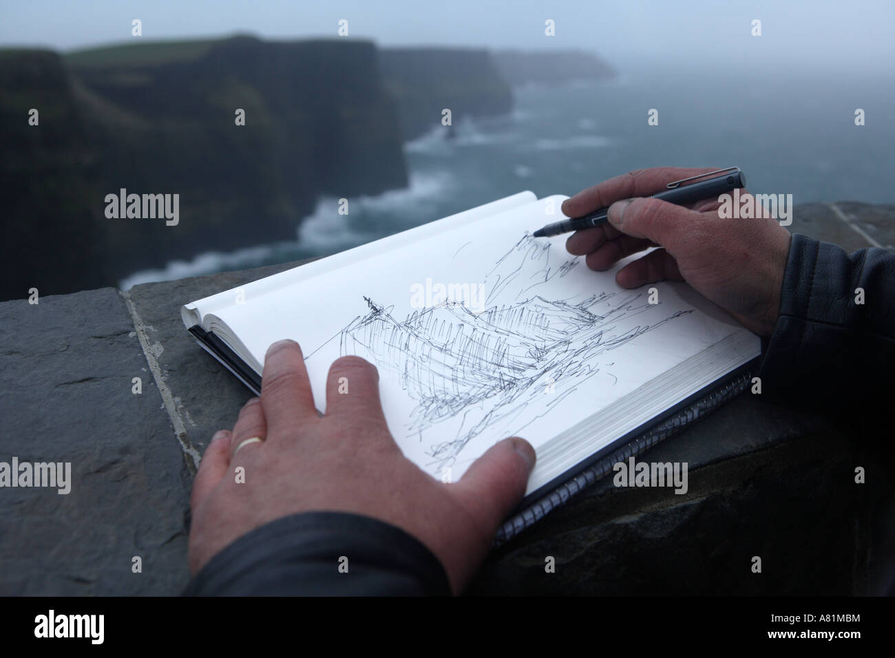 Artist drawing The Cliffs of Moher, County Clare Stock Photo - Alamy