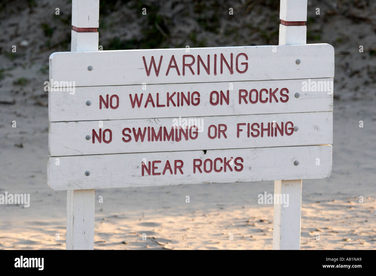 Warning sign on the beach at Grand Isle Louisiana Stock Photo - Alamy