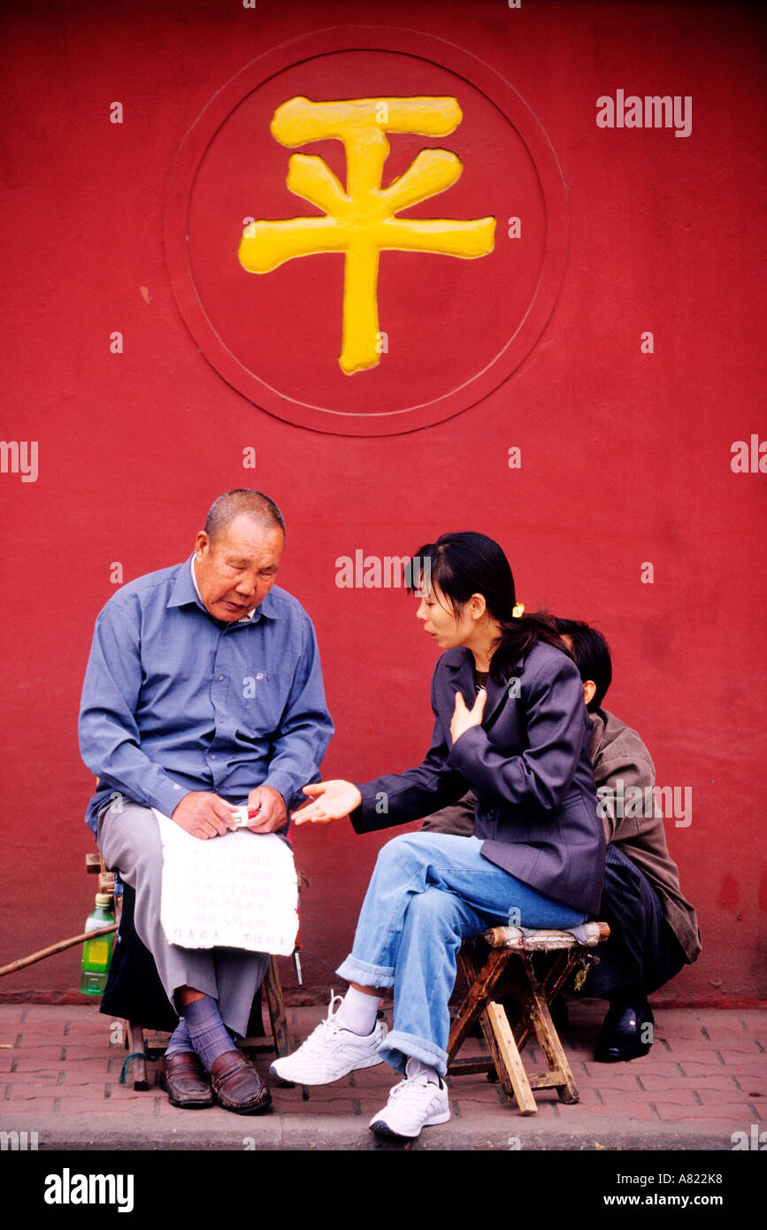 China, Sichuan province, Chengdu city, blind fortune teller in front of ...