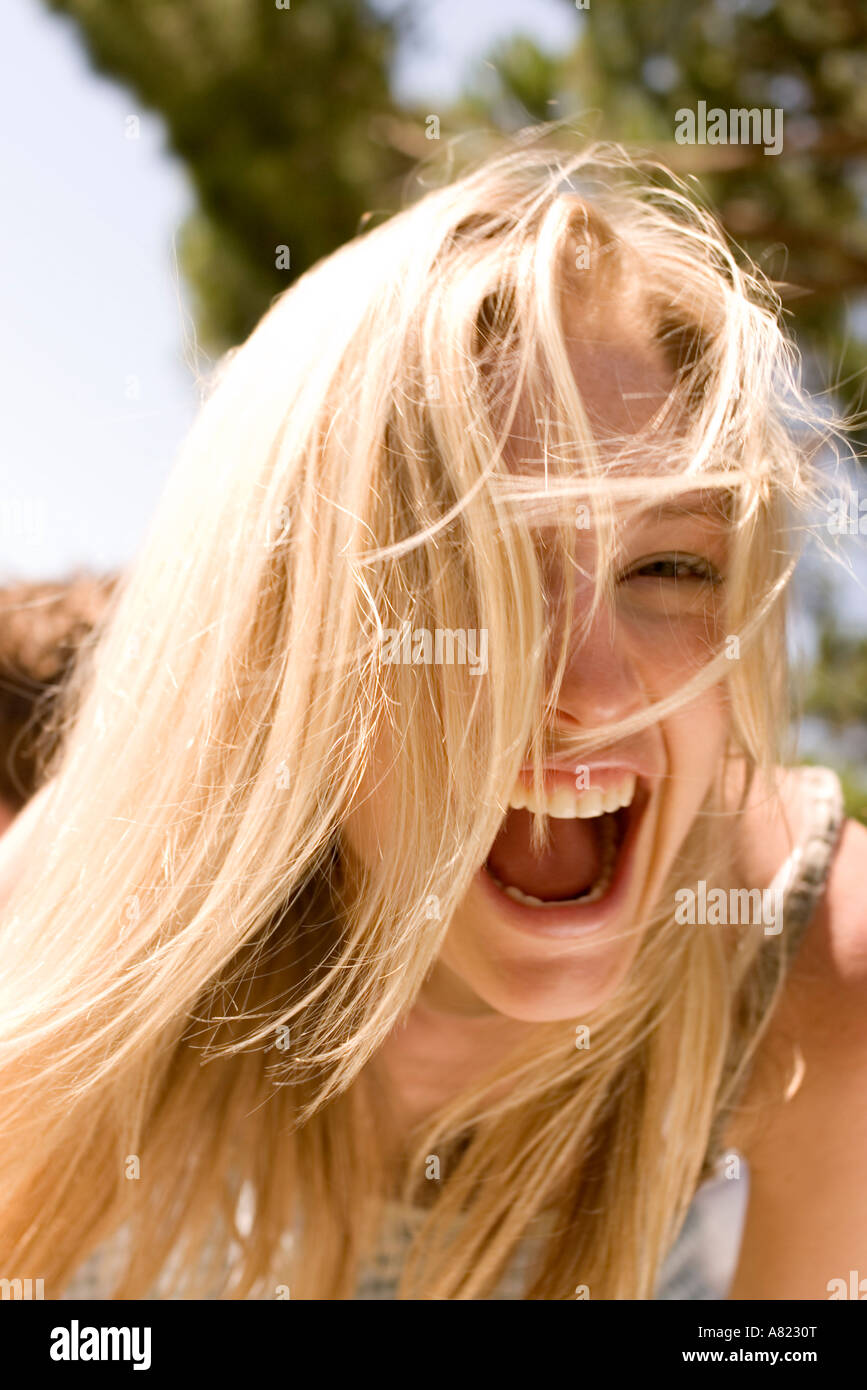 A man carrying a woman over his shoulder Stock Photo - Alamy
