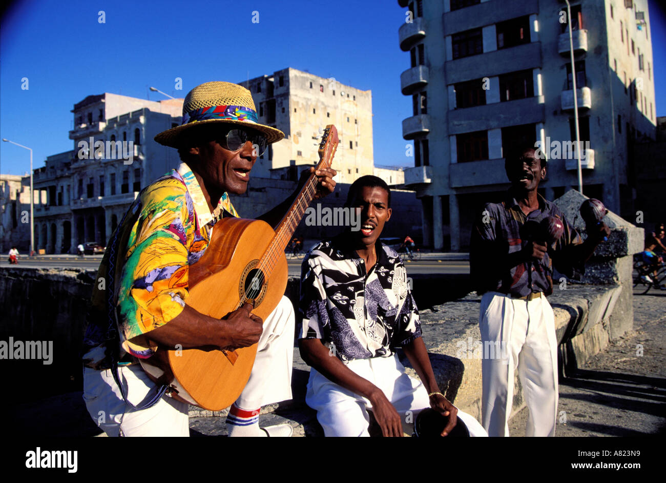 Cuba, Havana, trio of musicians on Malecon boulevard Stock Photo - Alamy