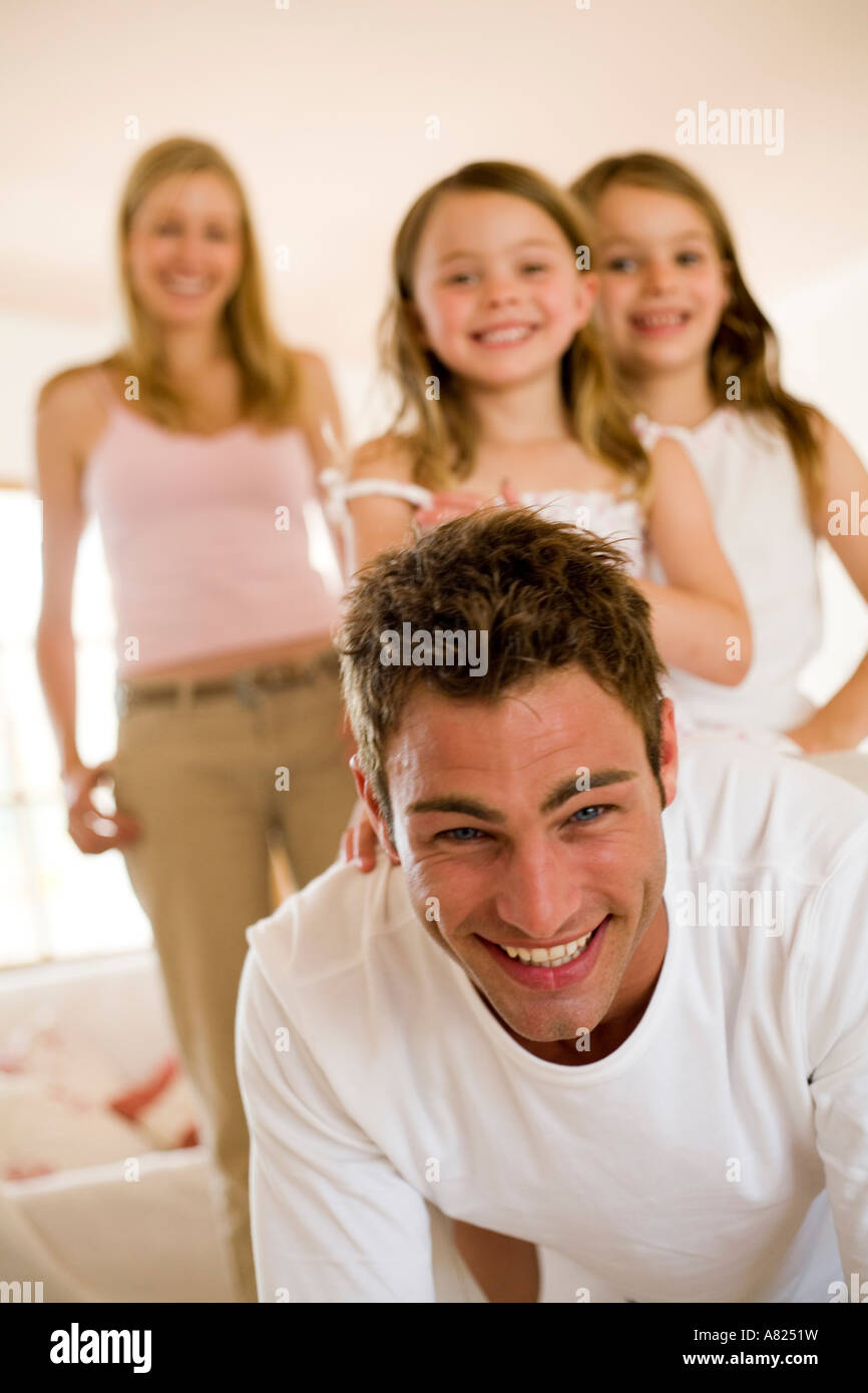 A family at home together Stock Photo - Alamy