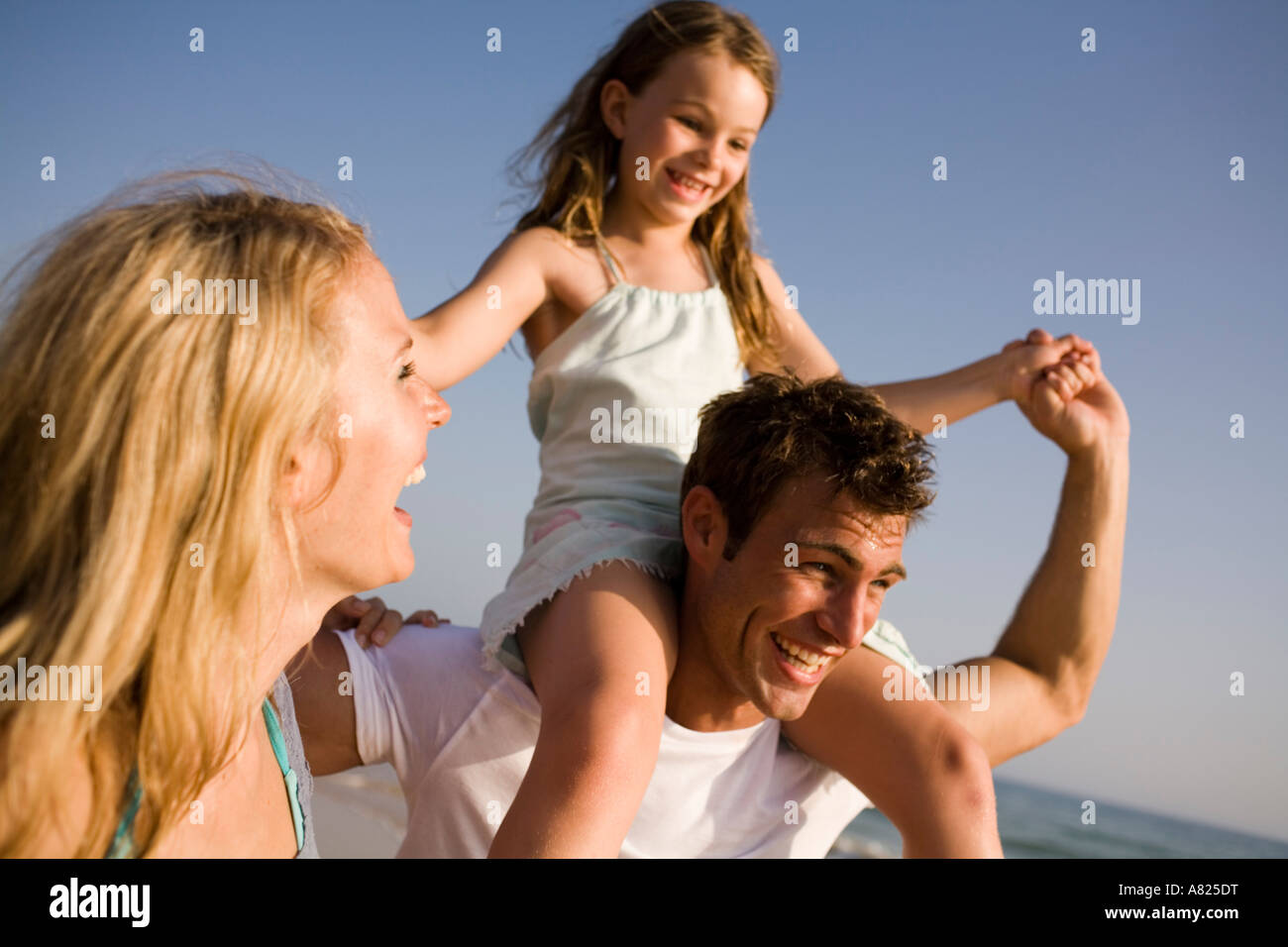 Giving daughter shoulder ride hi-res stock photography and images - Alamy