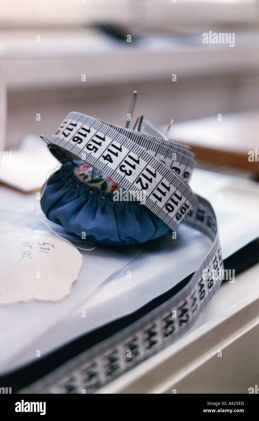 Needles and measuring tape Stock Photo - Alamy