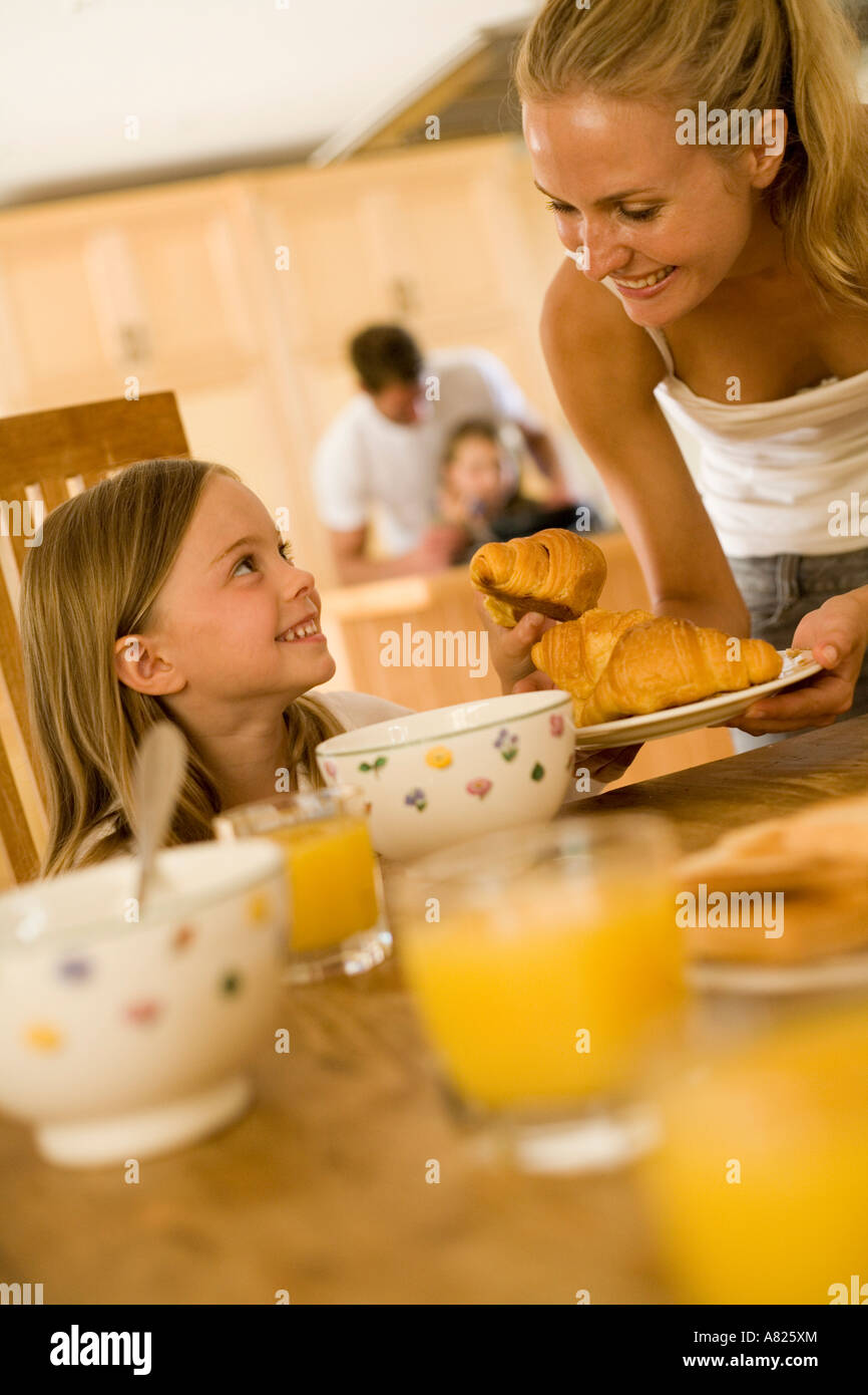 A family eating breakfast Stock Photo - Alamy