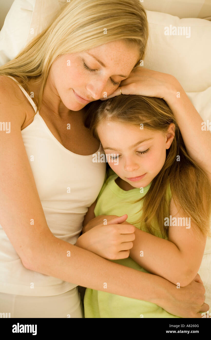 A mother and daughter sleeping Stock Photo - Alamy