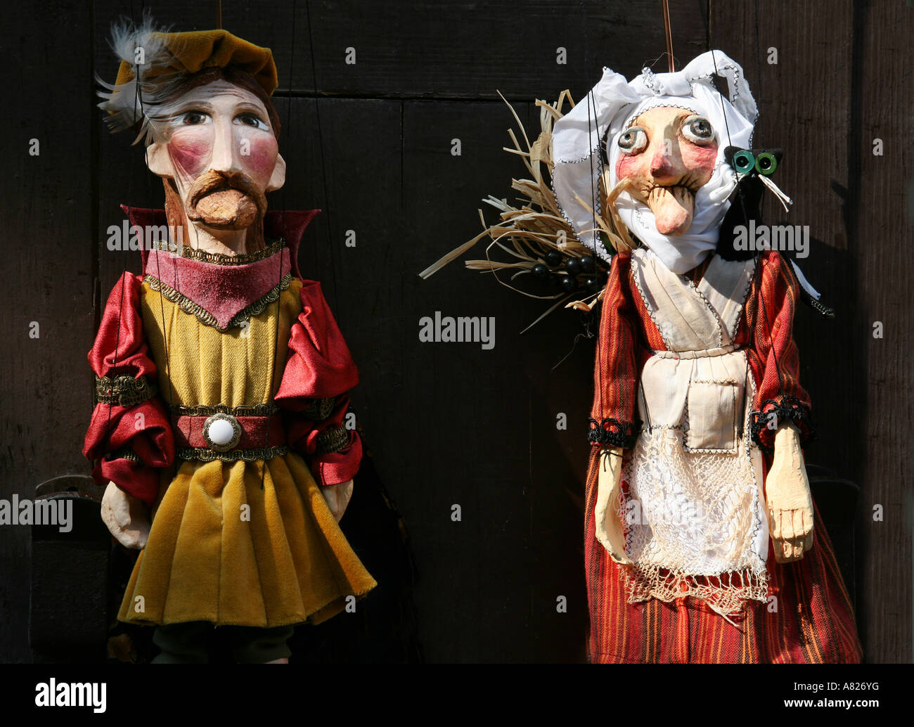 Wooden Punch and Judy toy puppets hanging in a doorway, Prague, Czech ...