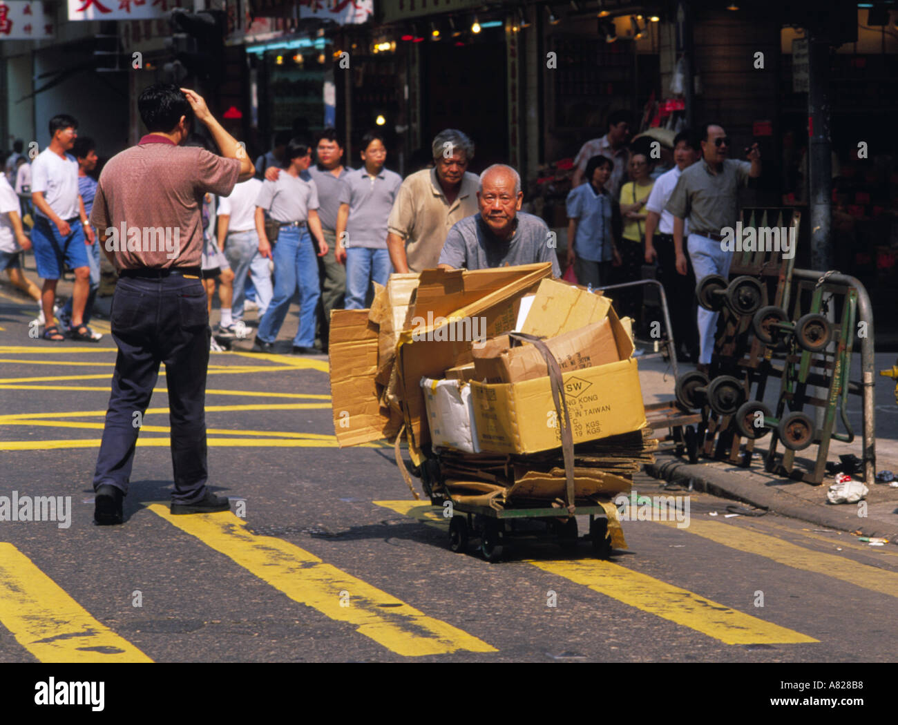 Old man collecting paper waste for a living central hong kong china ...
