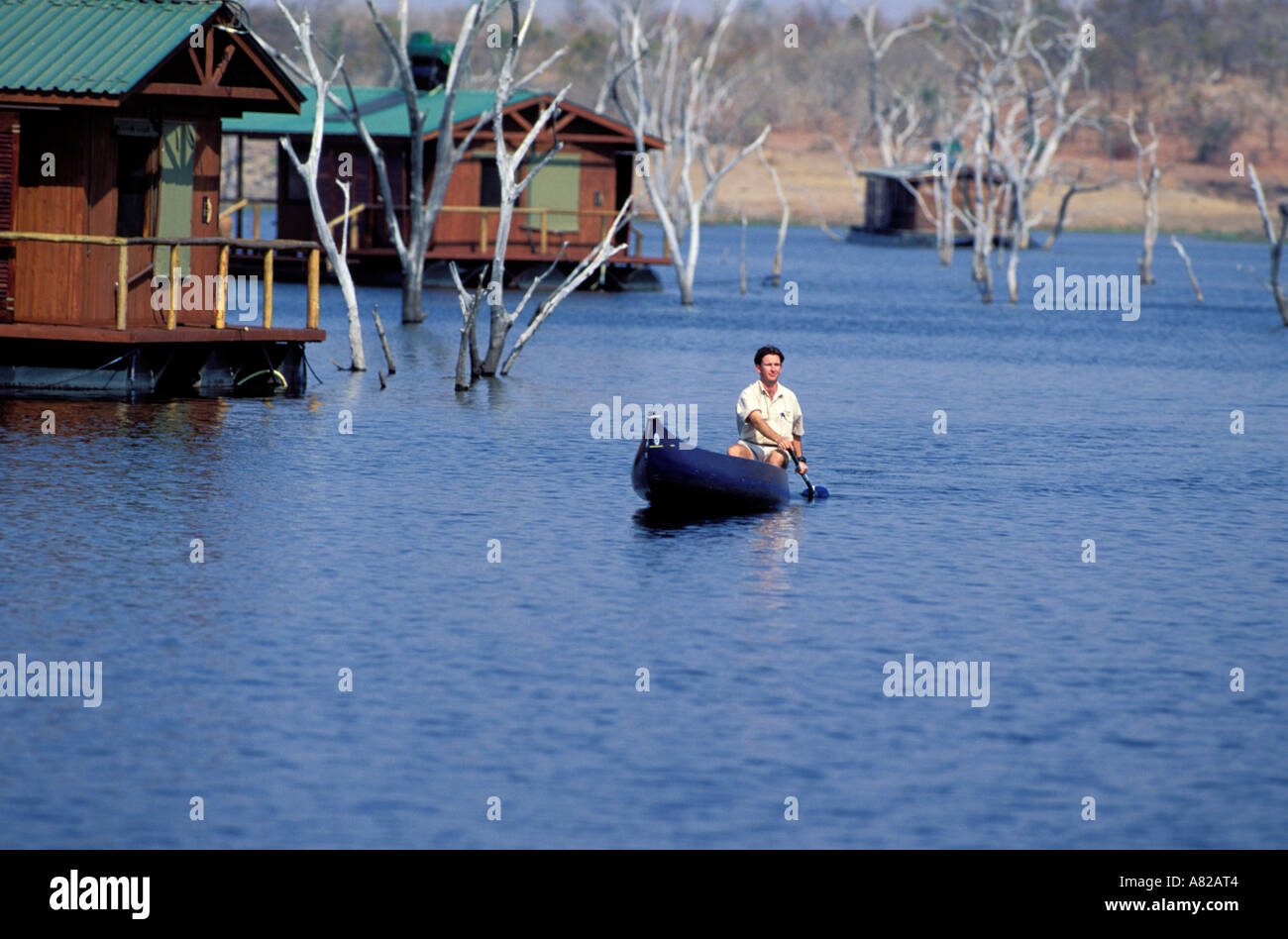 Zimbabwe, lake Kariba (Matusadona Water Lodge), the canoe is the only ...