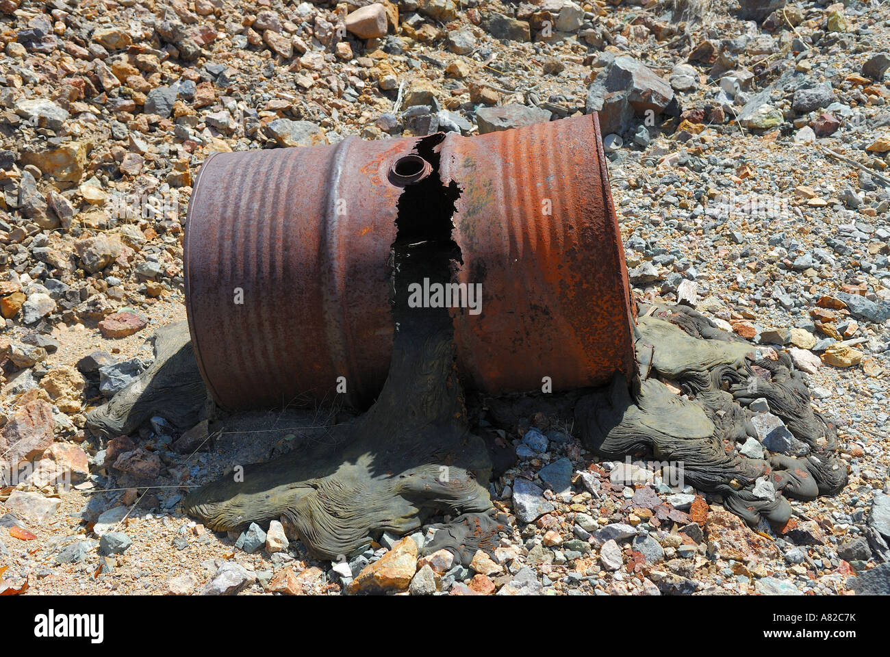 Sludge from ruptured barrel abandoned long ago Stock Photo - Alamy