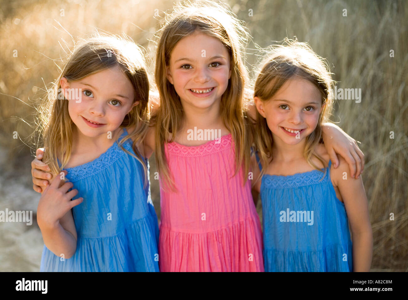 Three girls outdoors Stock Photo - Alamy