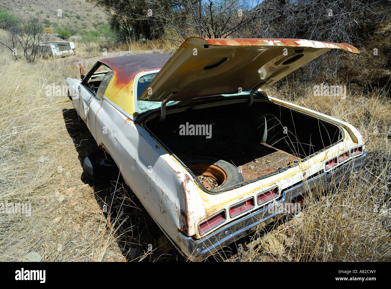 Abandoned Chevrolet coupe with trunk open Stock Photo - Alamy