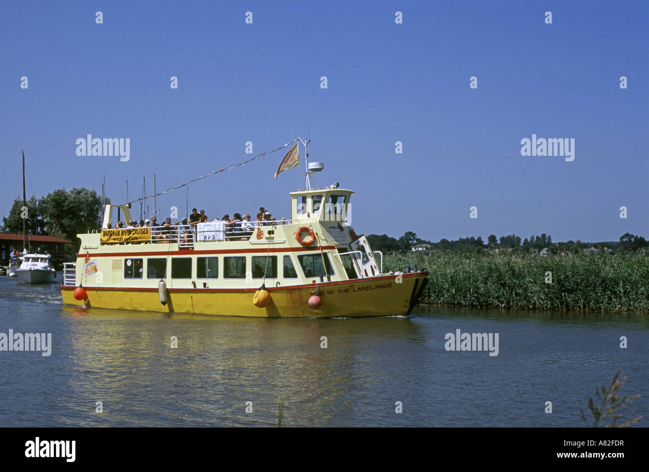 Pleasure boat "Maid of the Lakelands" on the River Frome near Wareham ...