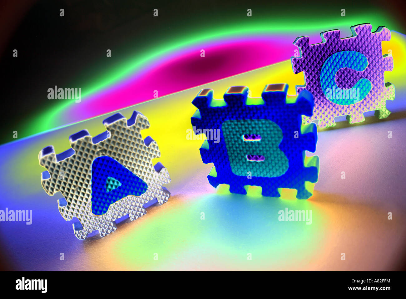 ABC puzzle pieces Stock Photo - Alamy