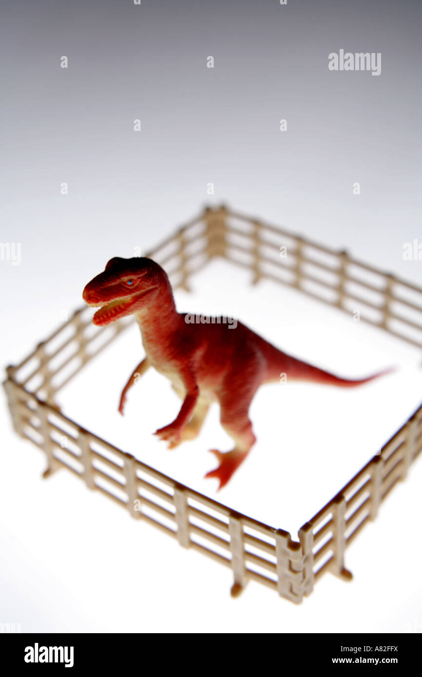 Dinosaur behind fence Stock Photo - Alamy
