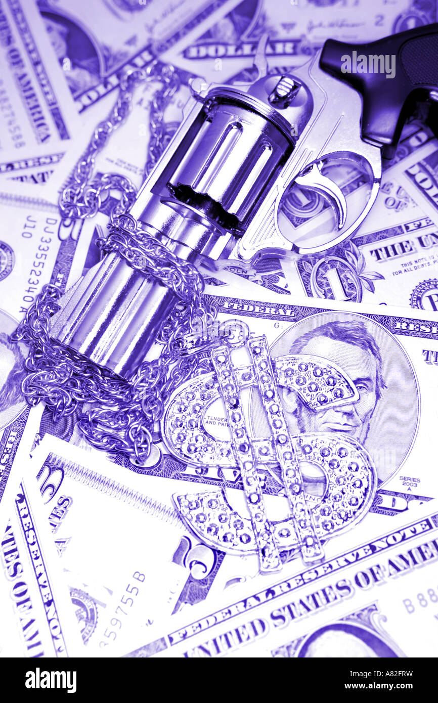 Gun and dollar symbol on U.S. currency Stock Photo - Alamy