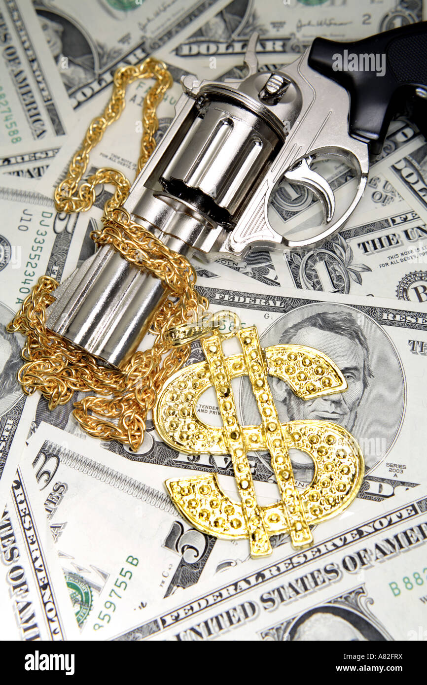 Gun and dollar symbol on U.S. currency Stock Photo - Alamy