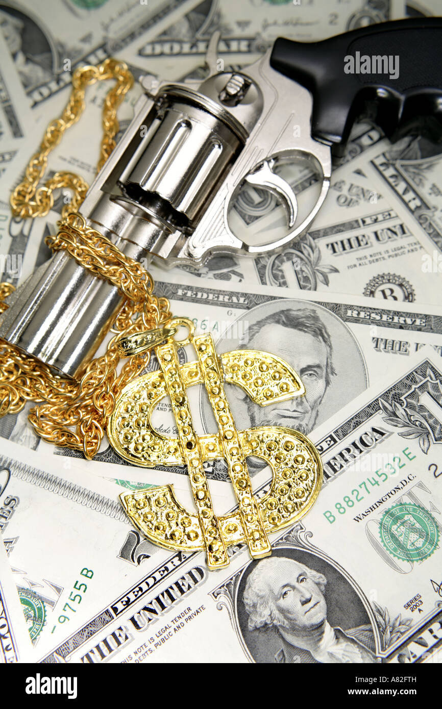 Gun and dollar symbol on U.S. currency Stock Photo - Alamy