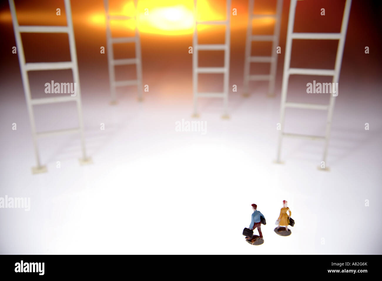 Two people in front of ladders Stock Photo - Alamy