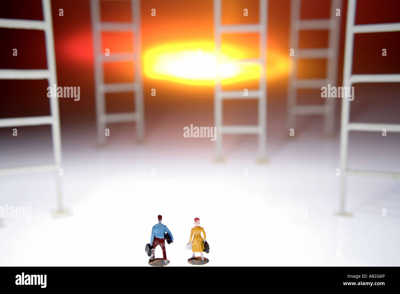 Two people in front of ladders Stock Photo - Alamy