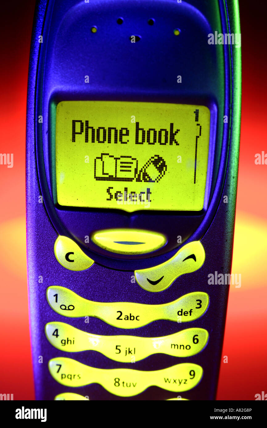 Mobile phone displaying phonebook on screen Stock Photo - Alamy