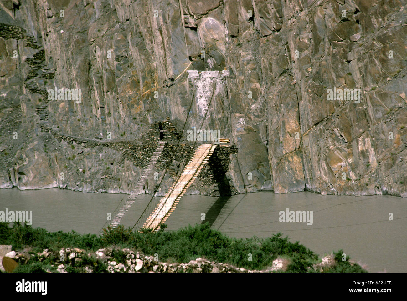 Pakistan Azad Kashmir Gulmit rope bridges over the Hunza river Stock ...