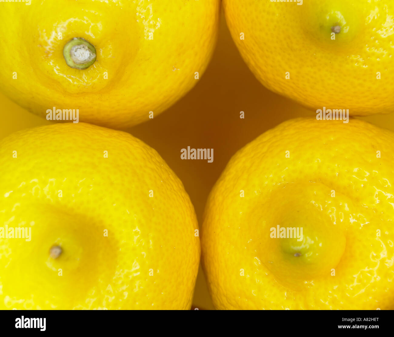 four whole lemons Stock Photo - Alamy