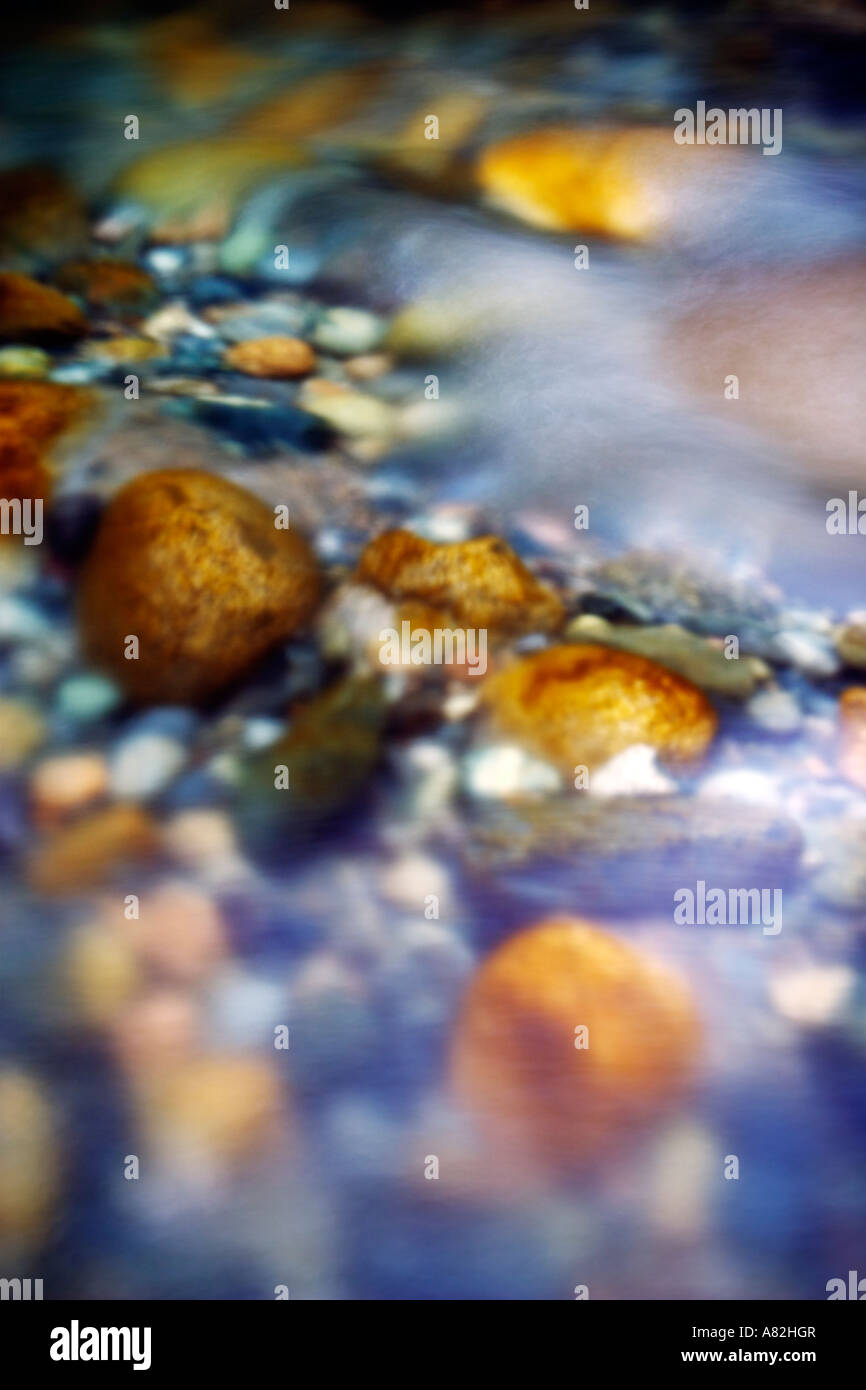 Water running over pebbles rocks hi-res stock photography and images ...