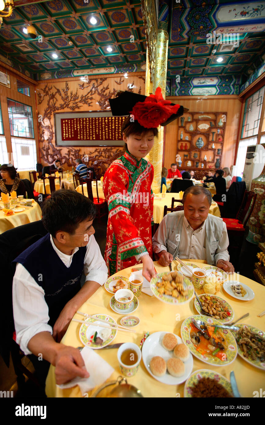 Chinese restaurant interior waitress hi-res stock photography and ...