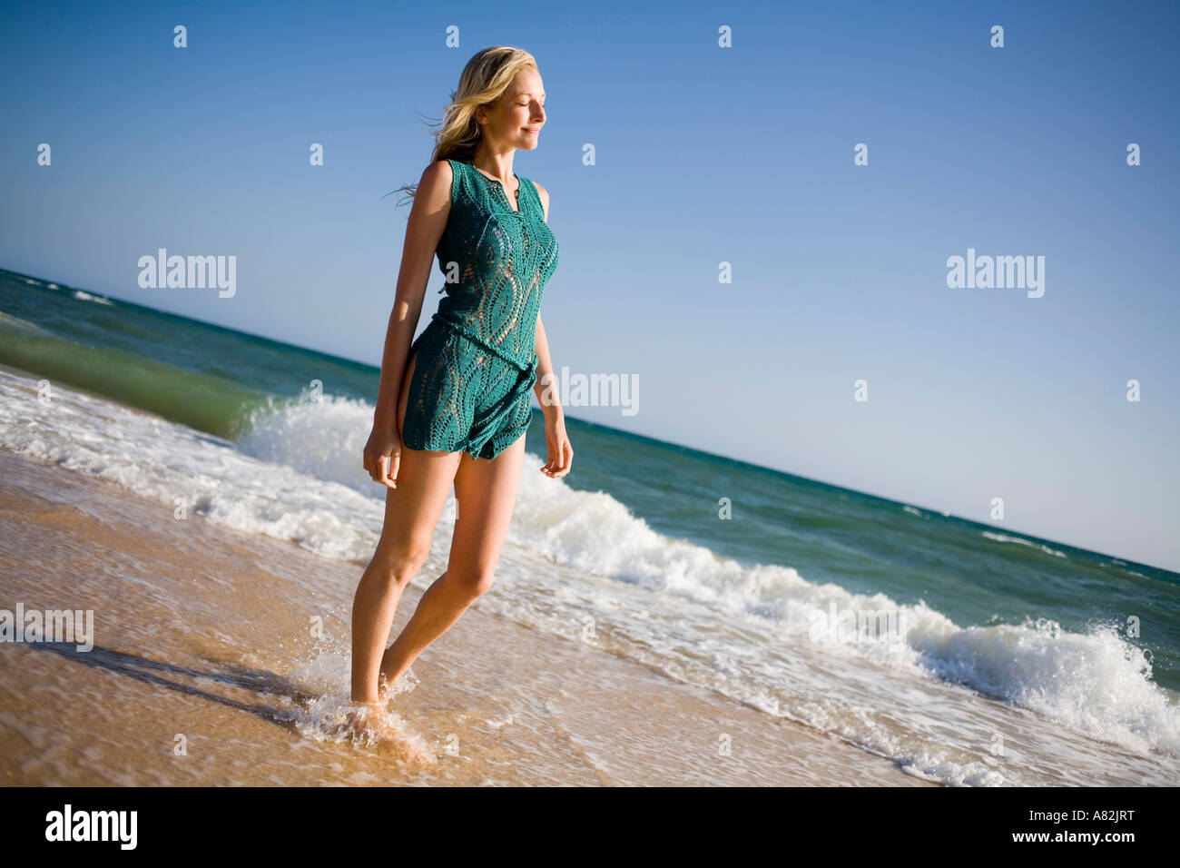 A woman at the beach Stock Photo - Alamy