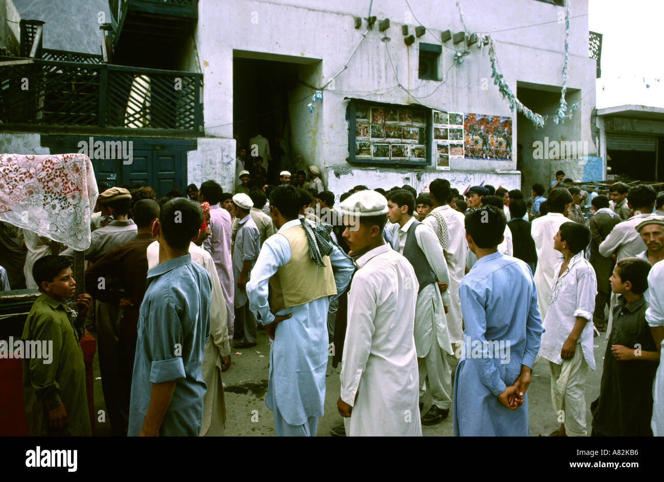 Pakistan Azad Kashmir Gilgit men outside Cinema Bazaar Stock Photo - Alamy