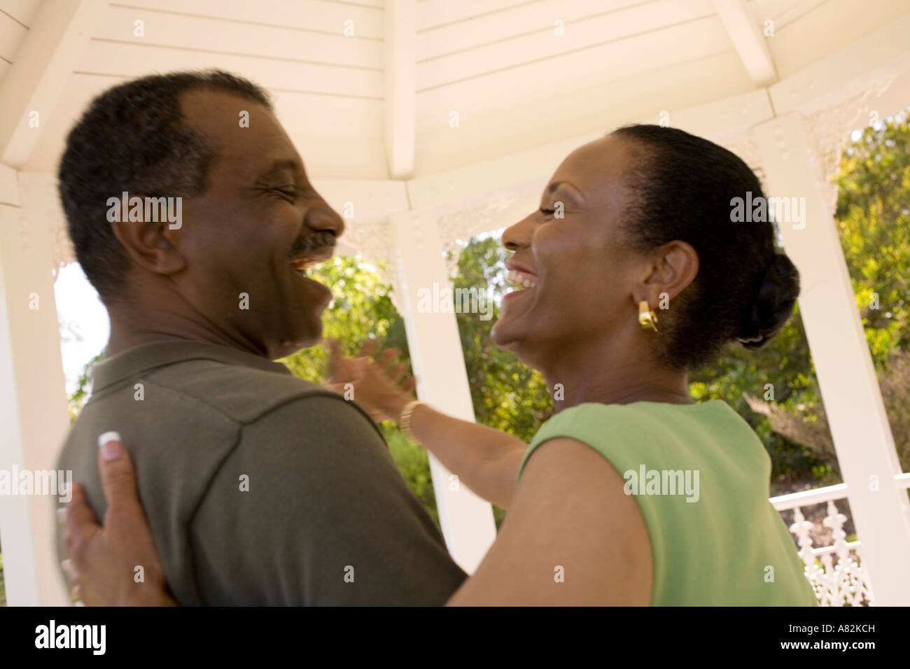 A couple in a gazebo dancing Stock Photo - Alamy