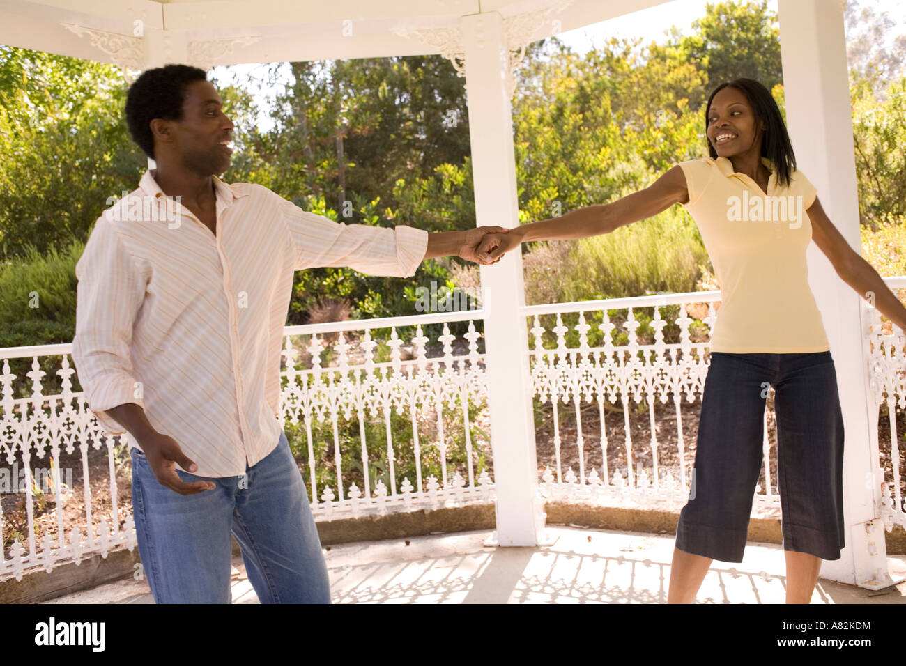A couple in a gazebo dancing Stock Photo - Alamy
