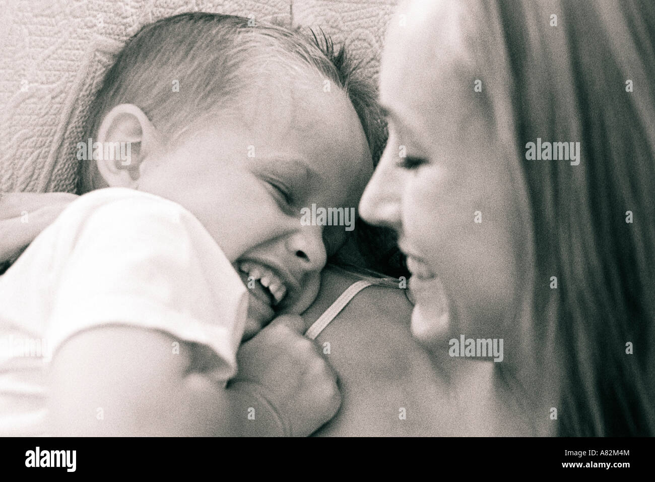 A mother laughing with her son Stock Photo - Alamy