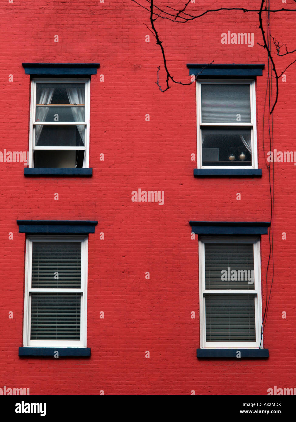 Four windows red brick house hi-res stock photography and images - Alamy
