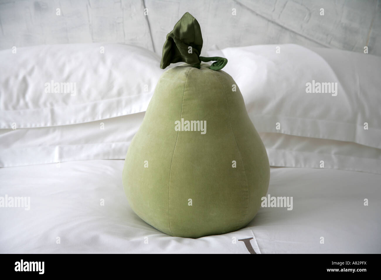 Pear cushion on the bed of a suite in the Londa Beach Hotel Limasol ...