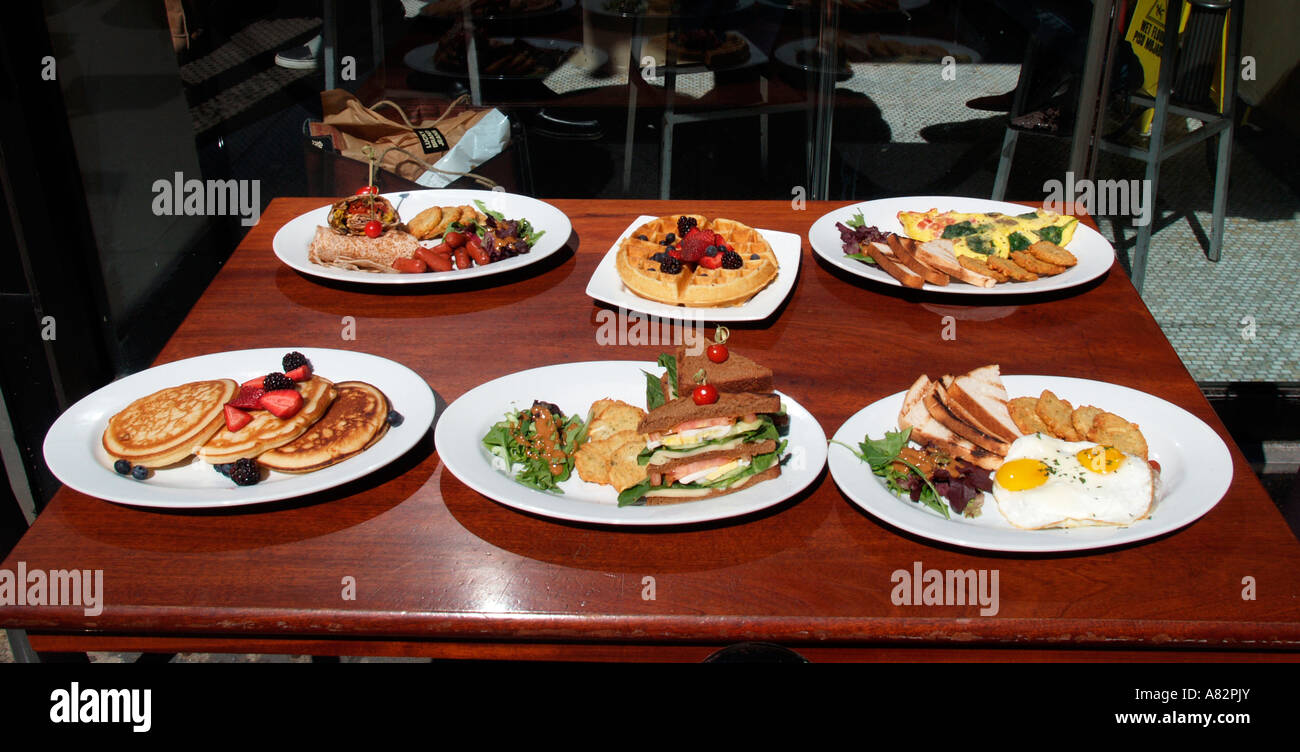 food spread plates of food on display outside restaurant diner New York ...