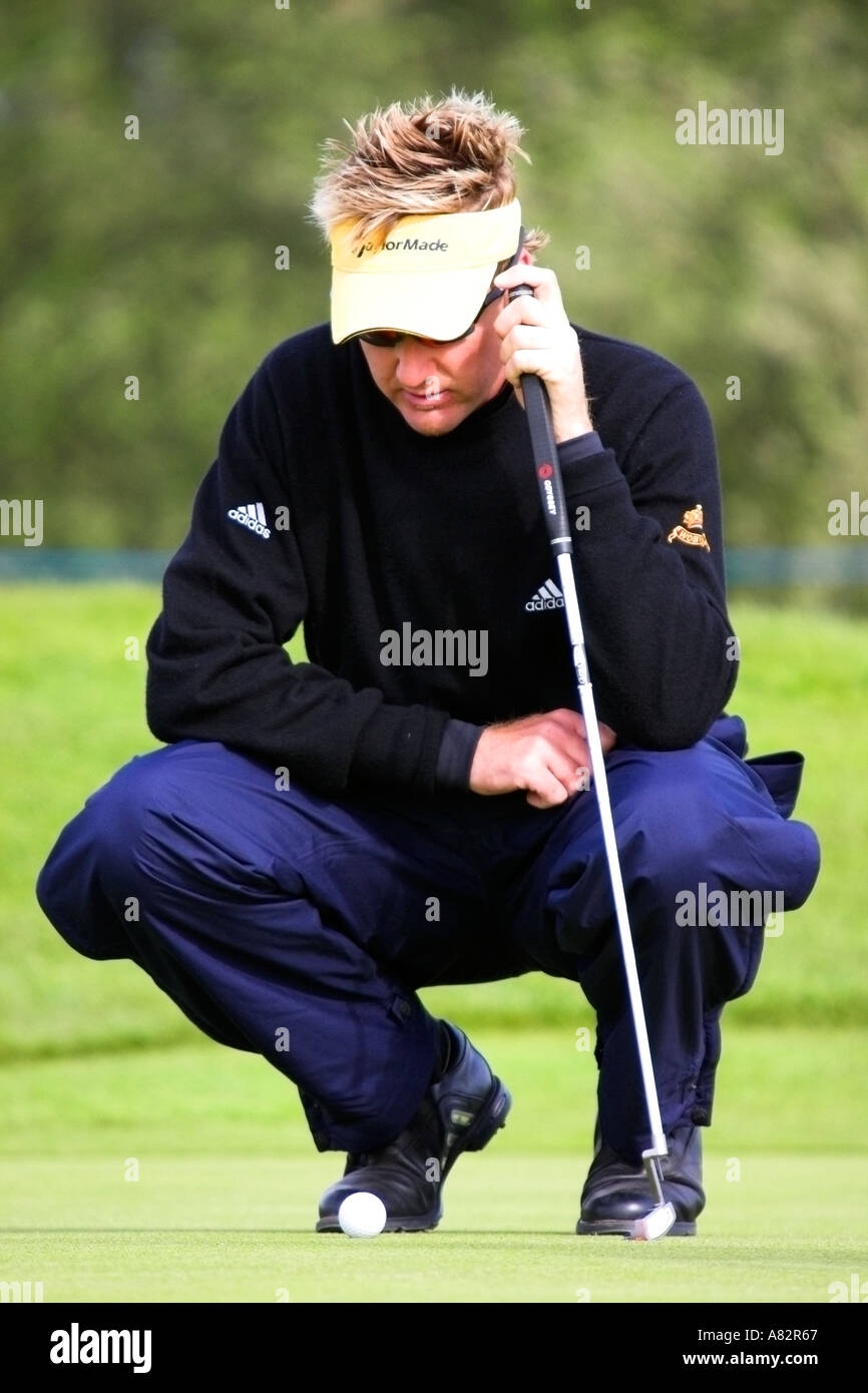 Sport golf cap action crouching ian poulter hi-res stock photography ...