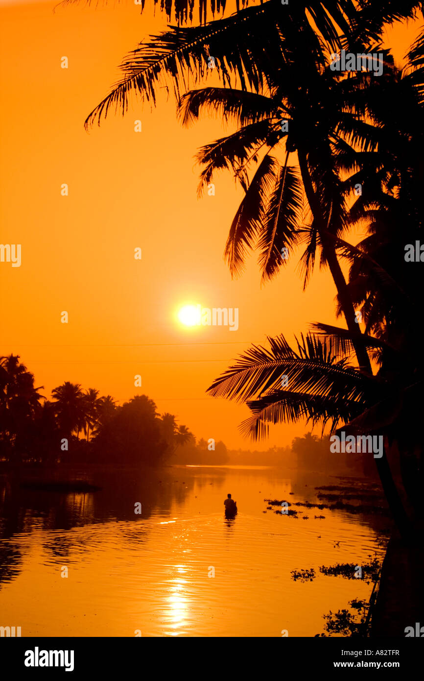 India Kerala backwaters indian people in canoe Stock Photo - Alamy