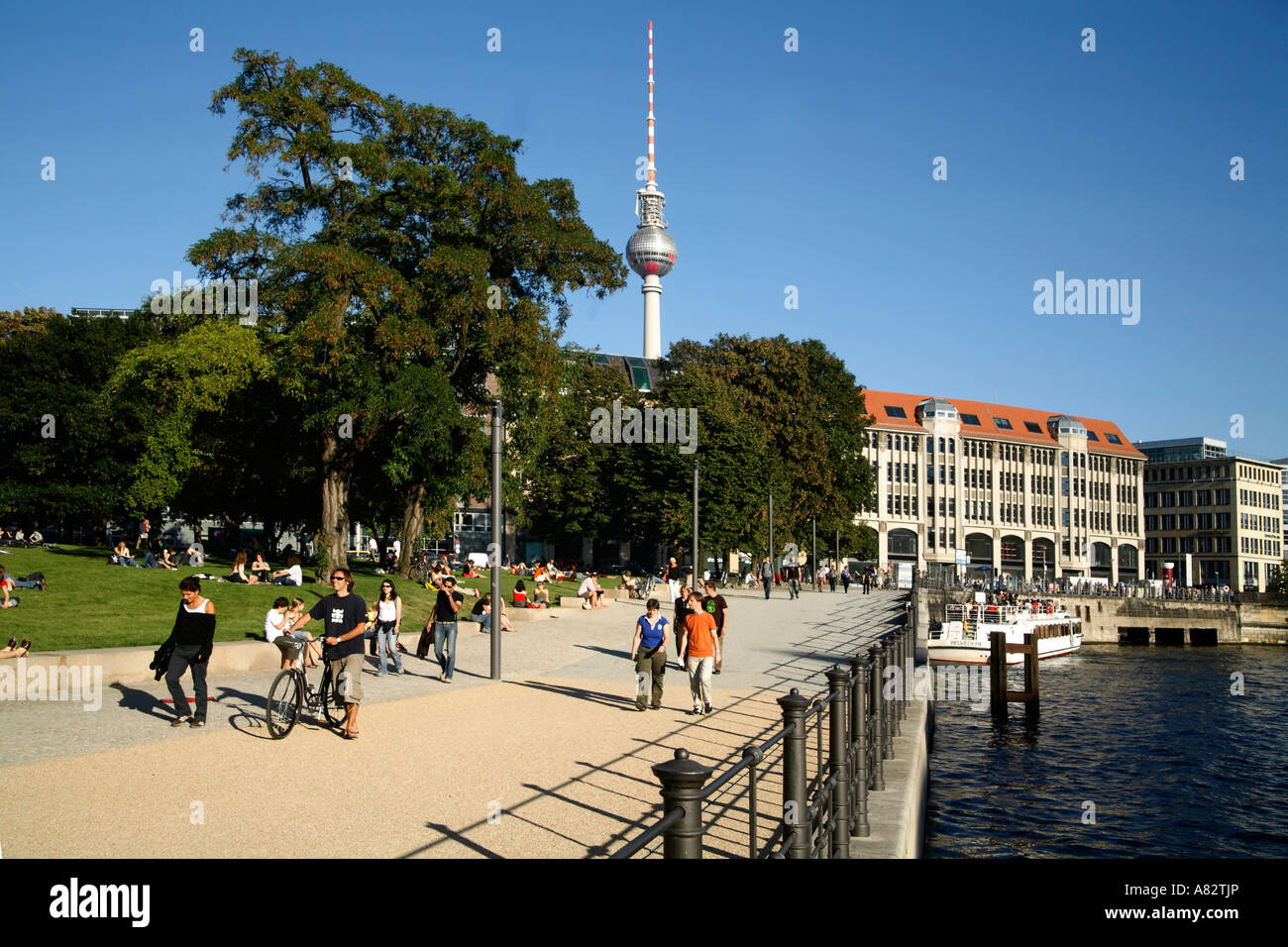Berlin Promenade at river Spree Monbijou park Stock Photo - Alamy